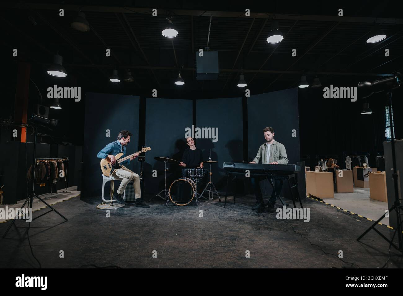 Musicians rehearsing together in a creative studio environment before a ...