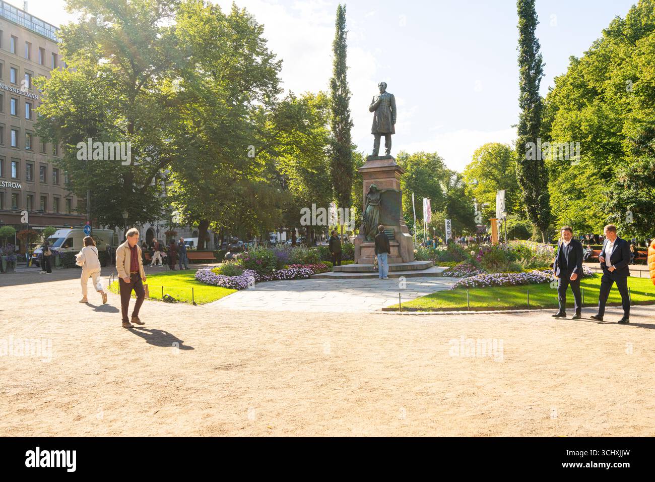 Helsinki, Finland. August 27 2025. people walking along Esplanadi park ...