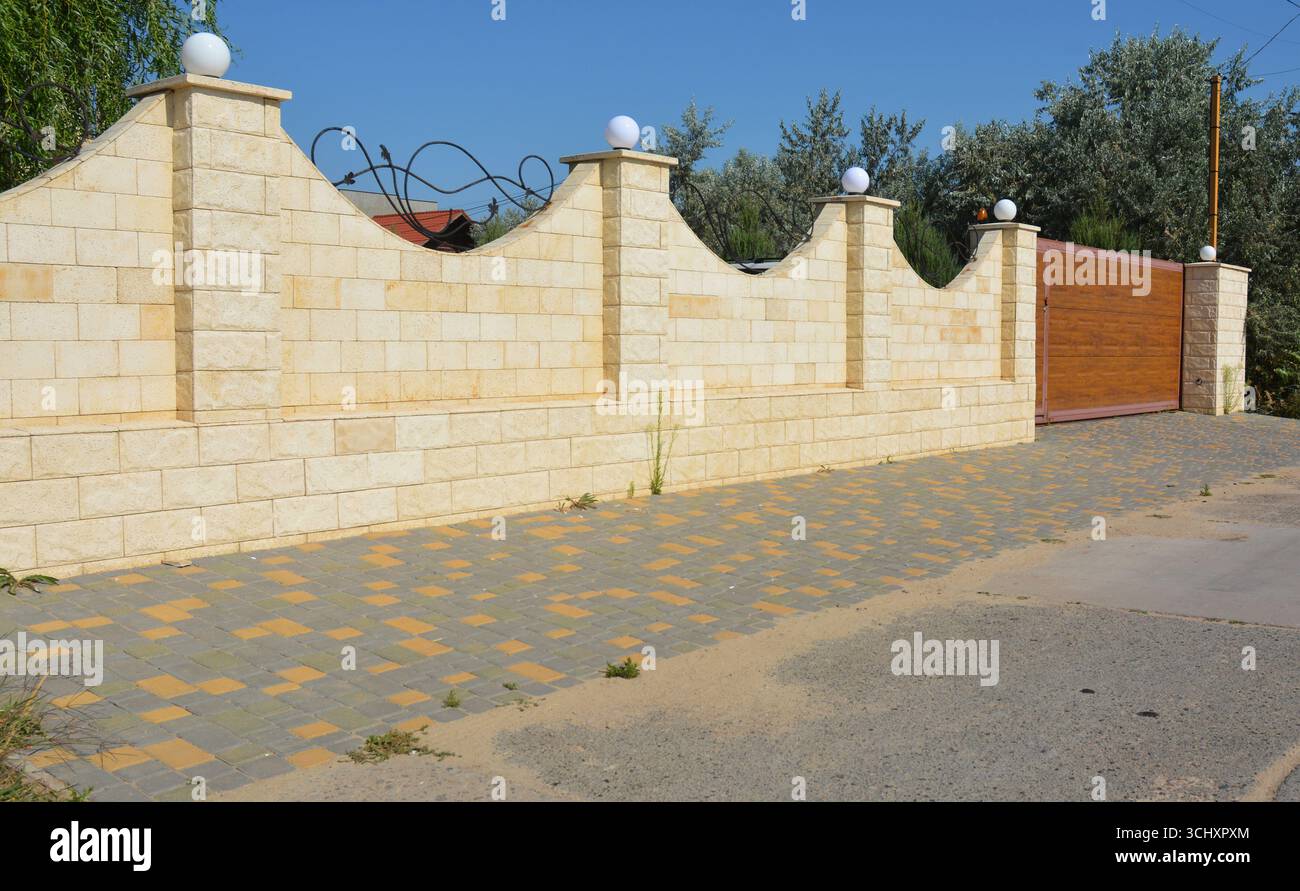 Fence lined decorative bricks hi-res stock photography and images - Alamy