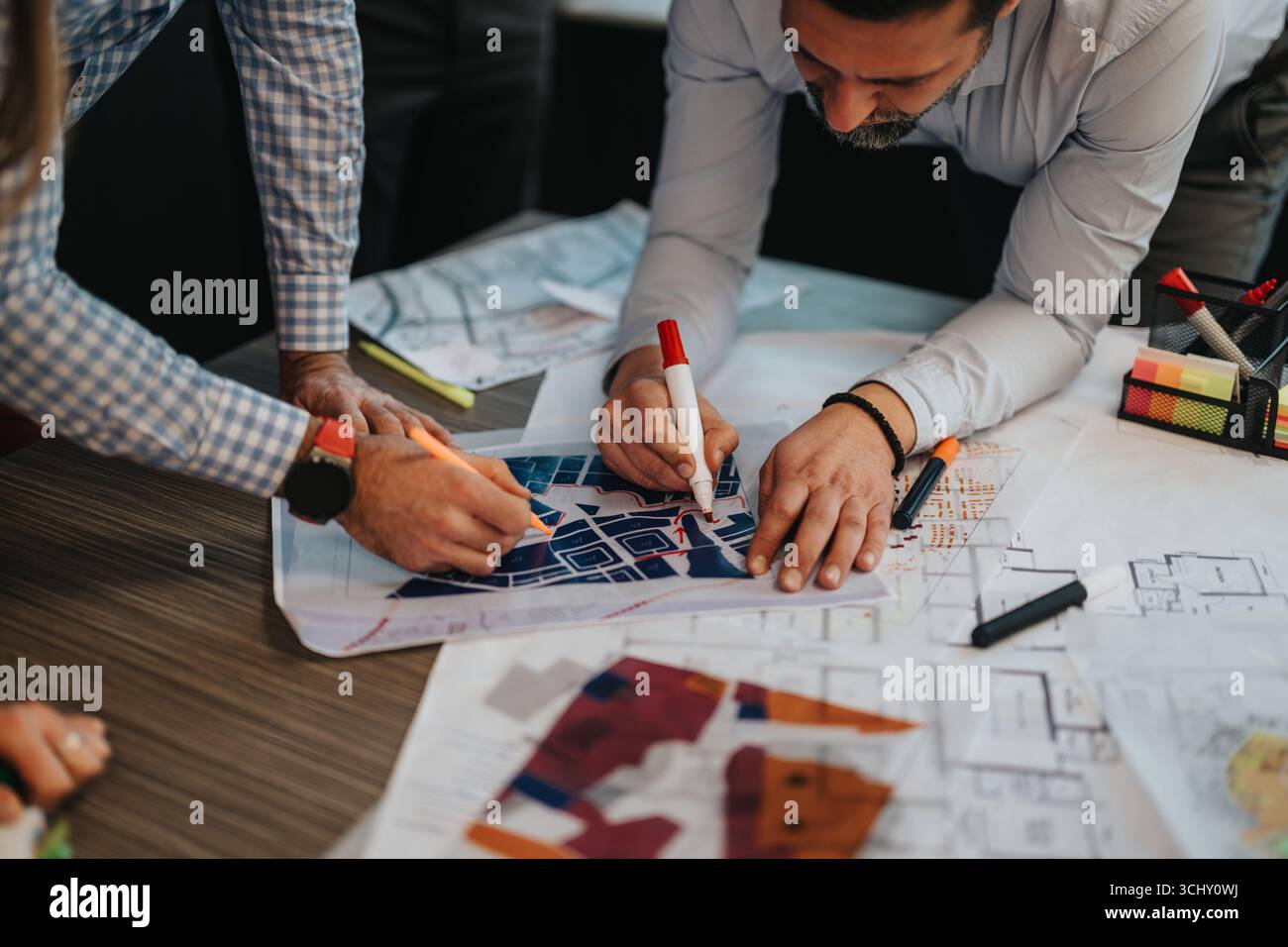 Team Collaborates on Architectural Design Concepts Using Blueprints in ...