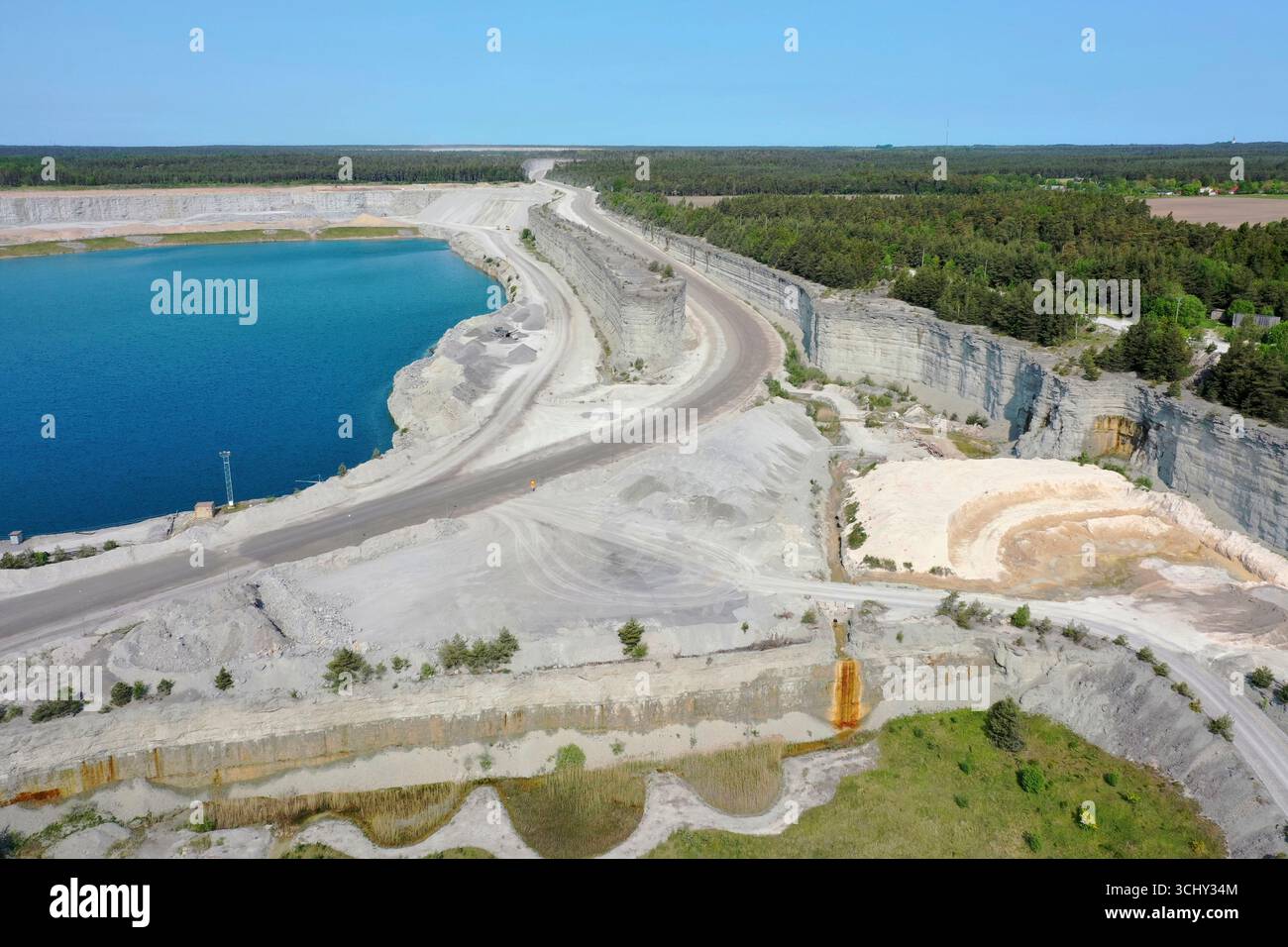 quarrying limestone for cement production, aerial view, Sweden, Gotland ...