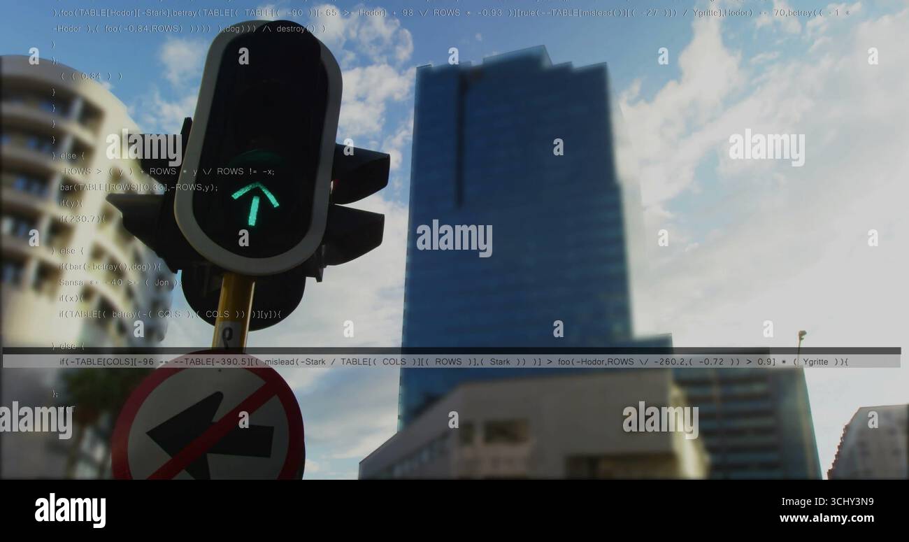 Displaying traffic light showing green up arrow, no-left-turn sign at ...