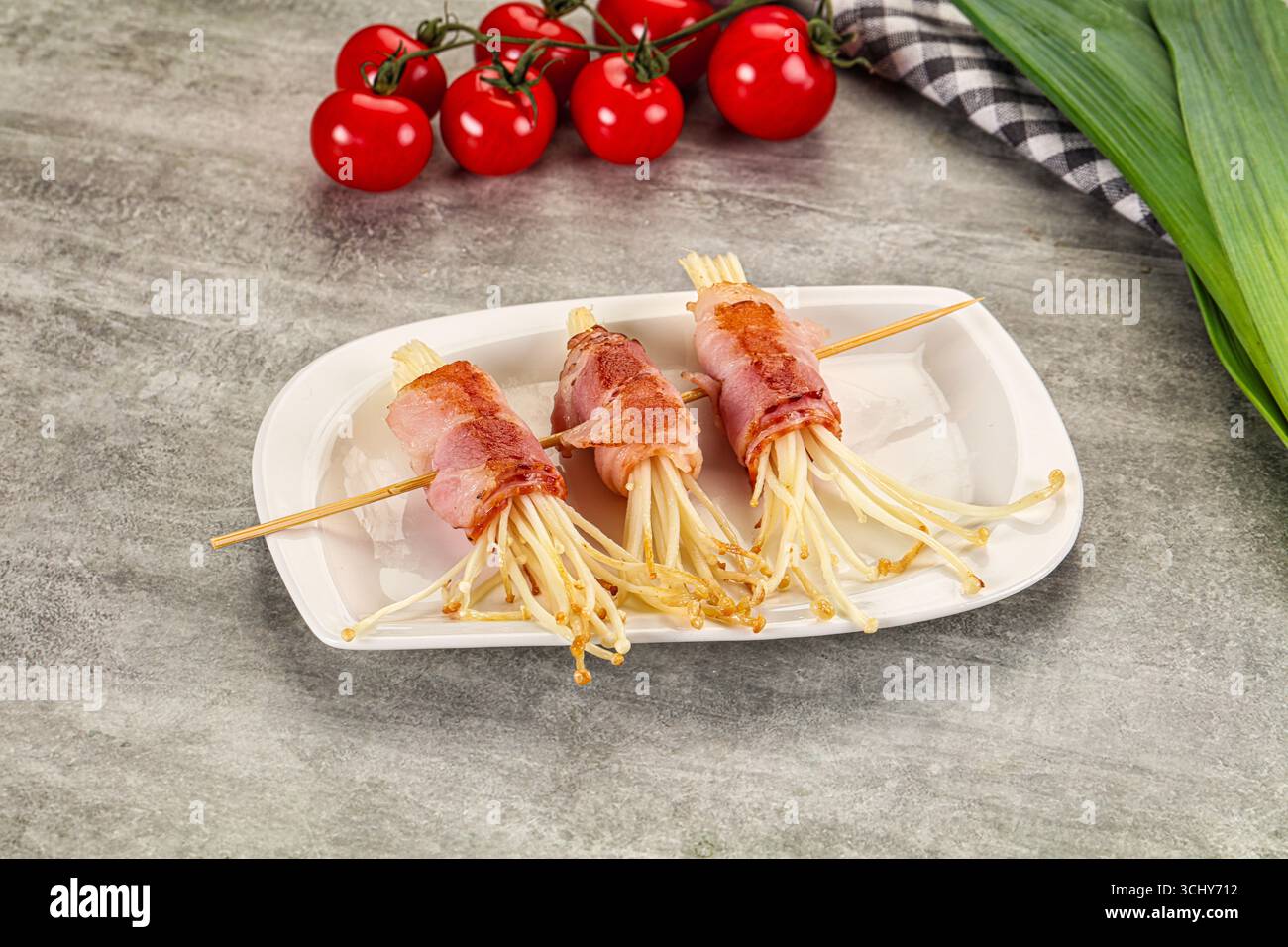 Grilled enoki mushroom with bacon roll wrap Stock Photo - Alamy