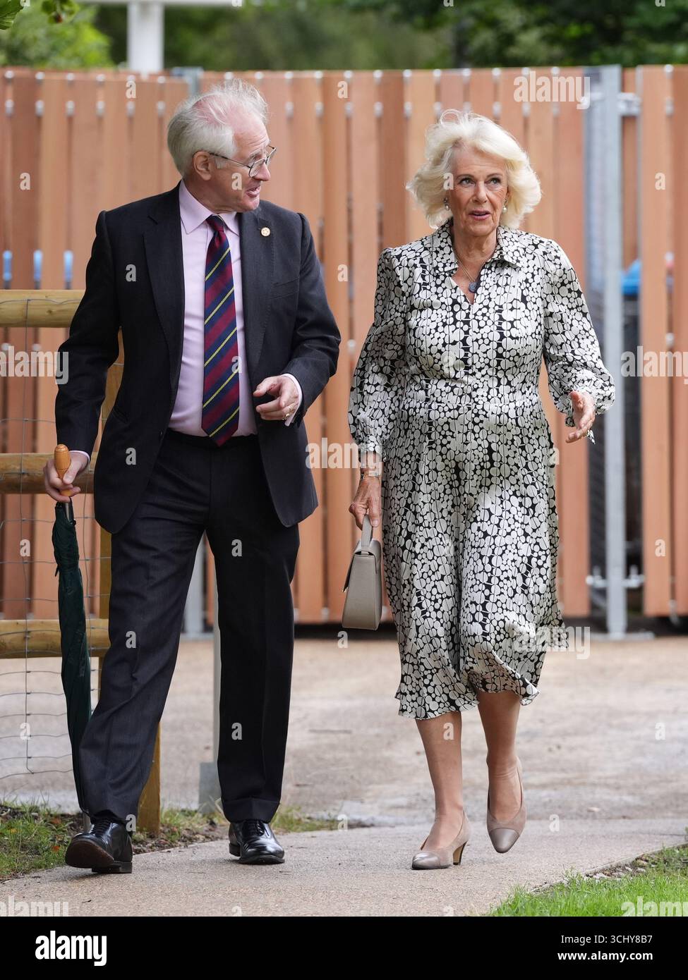 Queen Camilla is greeted by Simon Duckworth, Representative Deputy ...