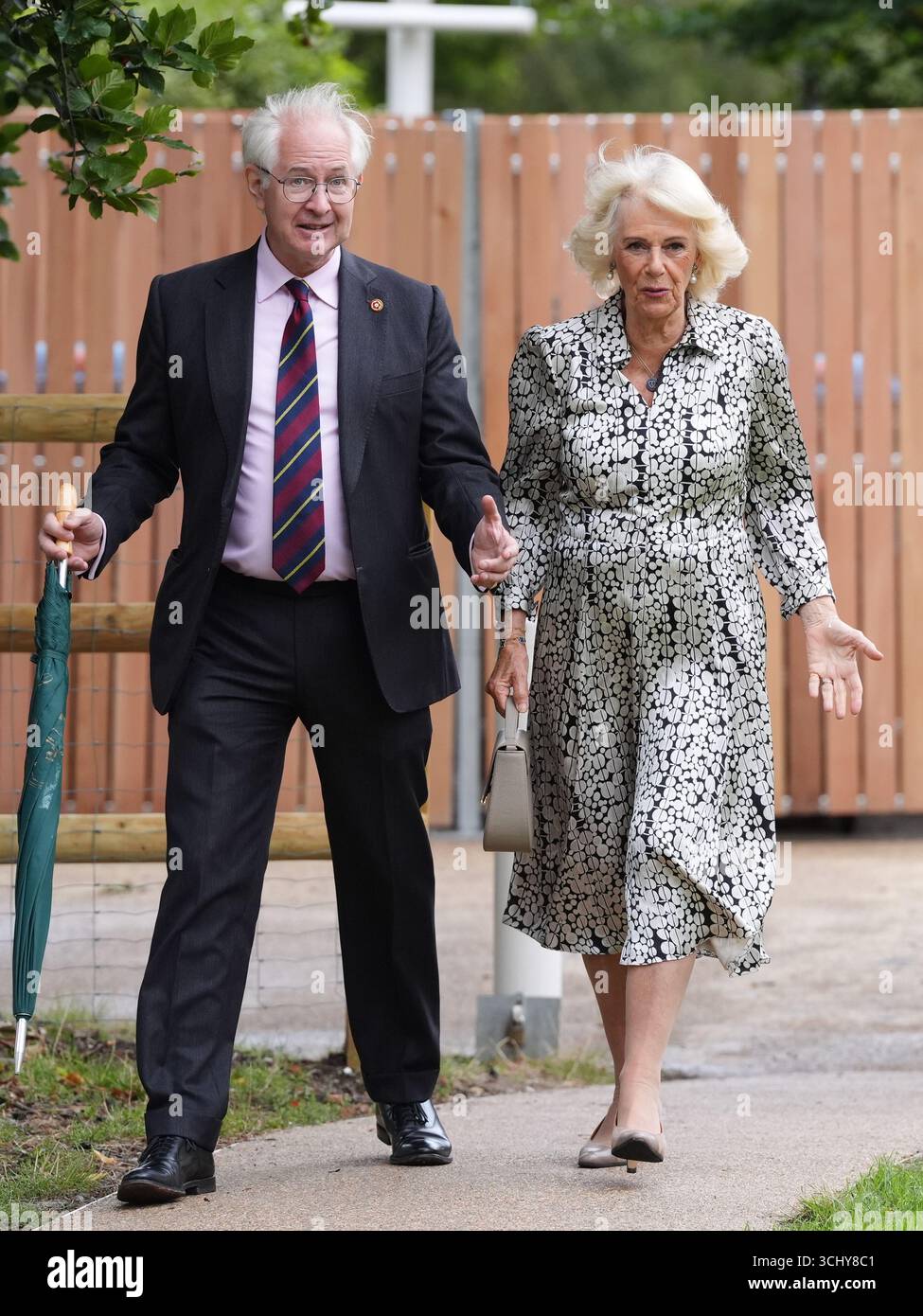 Queen Camilla is greeted by Simon Duckworth, Representative Deputy ...