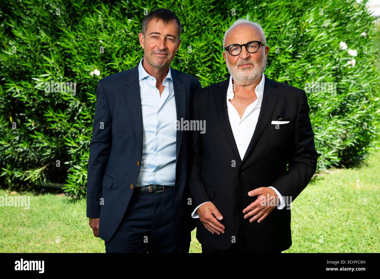 Sebastien Janin, left, and Marco Cherqui pose for a portrait photograph ...