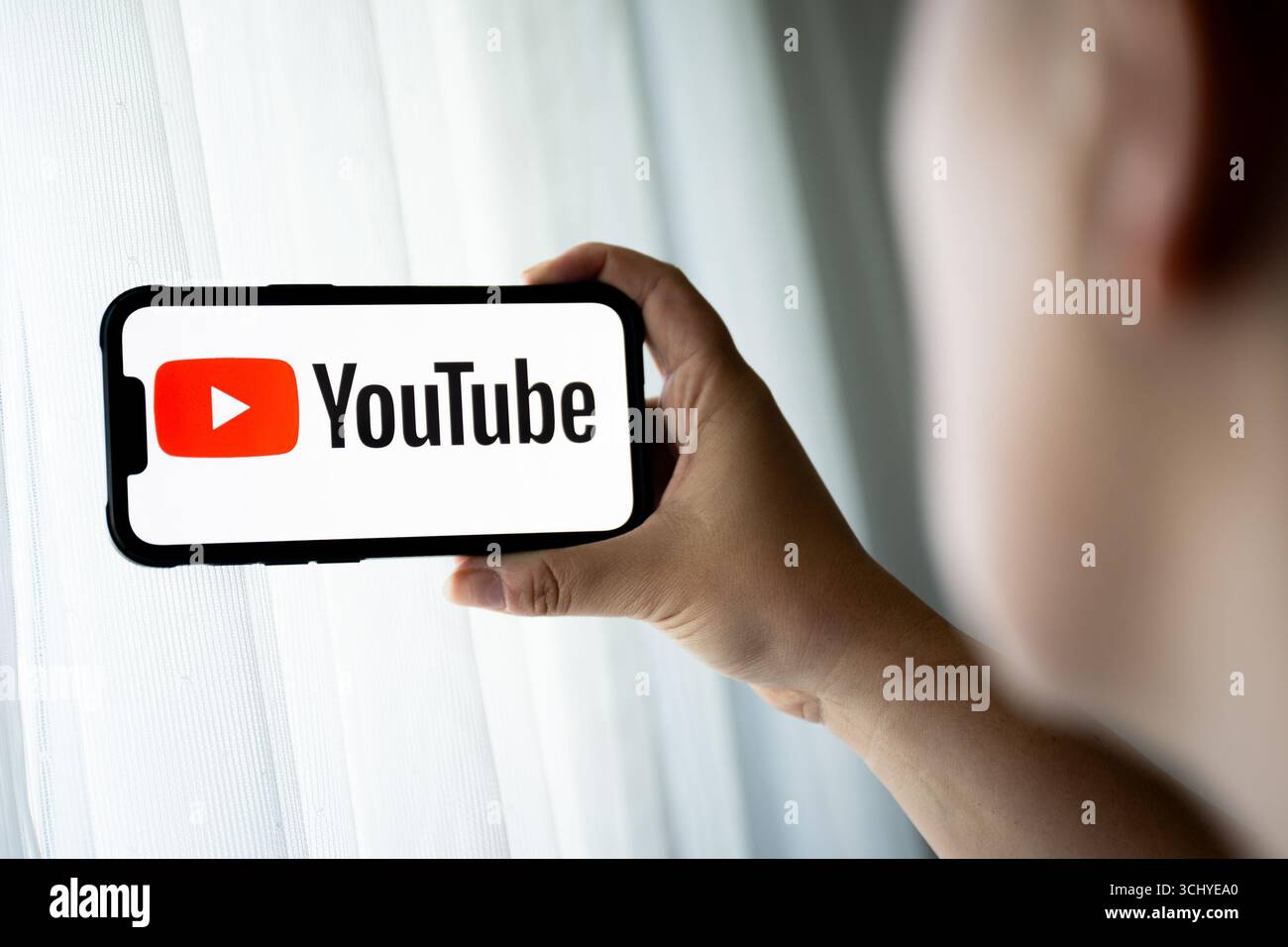 In this photo illustration, a YouTube logo is seen displayed on a smartphone. (Photo by Mateusz ...