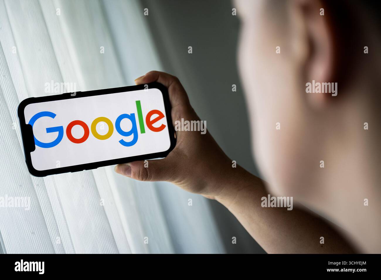 In this photo illustration, a Google logo is seen displayed on a smartphone. (Photo by Mateusz ...