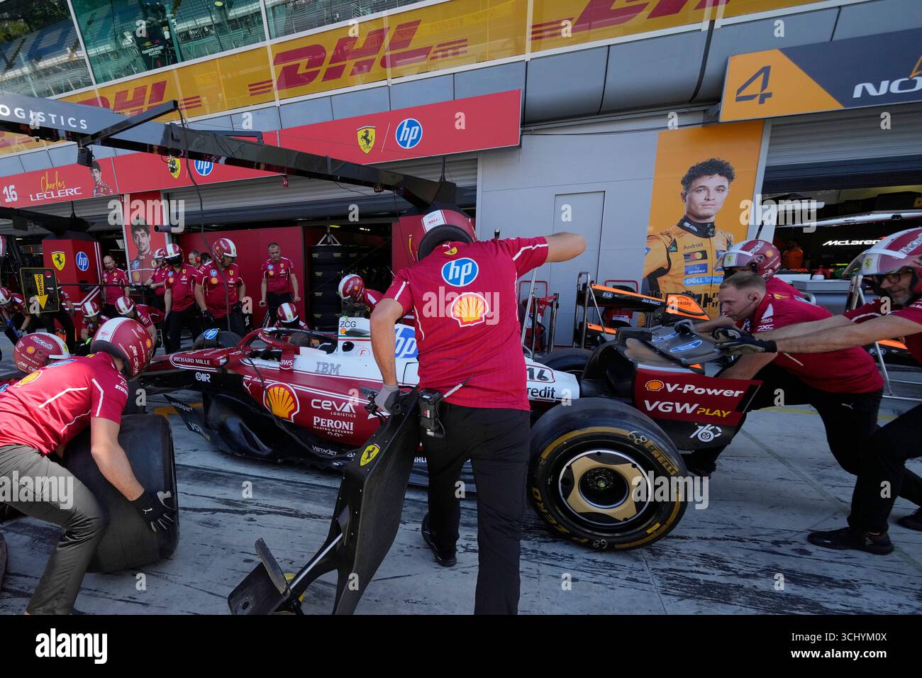Ferrari mechanics at the Monza racetrack, in Monza, Italy, Thursday ...