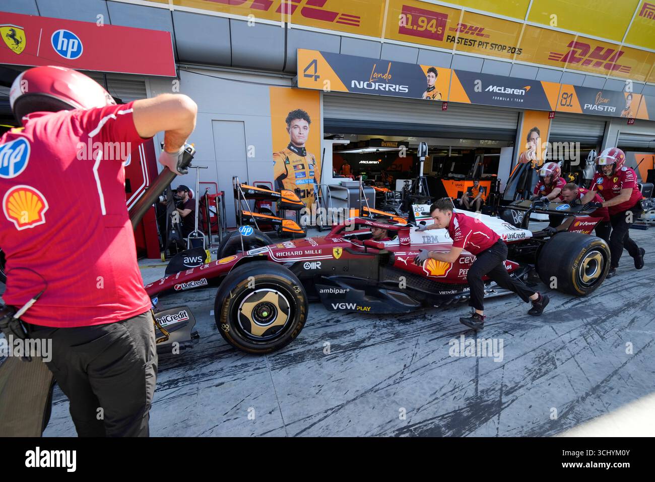 Ferrari mechanics at the Monza racetrack, in Monza, Italy, Thursday ...
