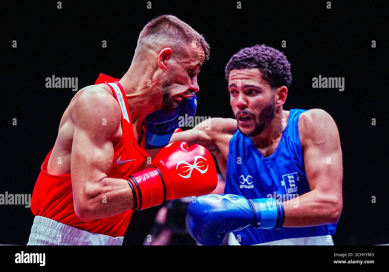 Ellis Trowbridge of England (right) in action against Ardit Murja of ...