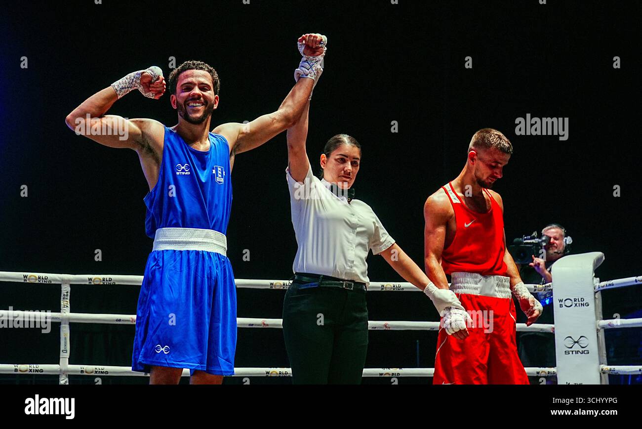 Ellis Trowbridge of England (left) celebrates his victory over Ardit ...