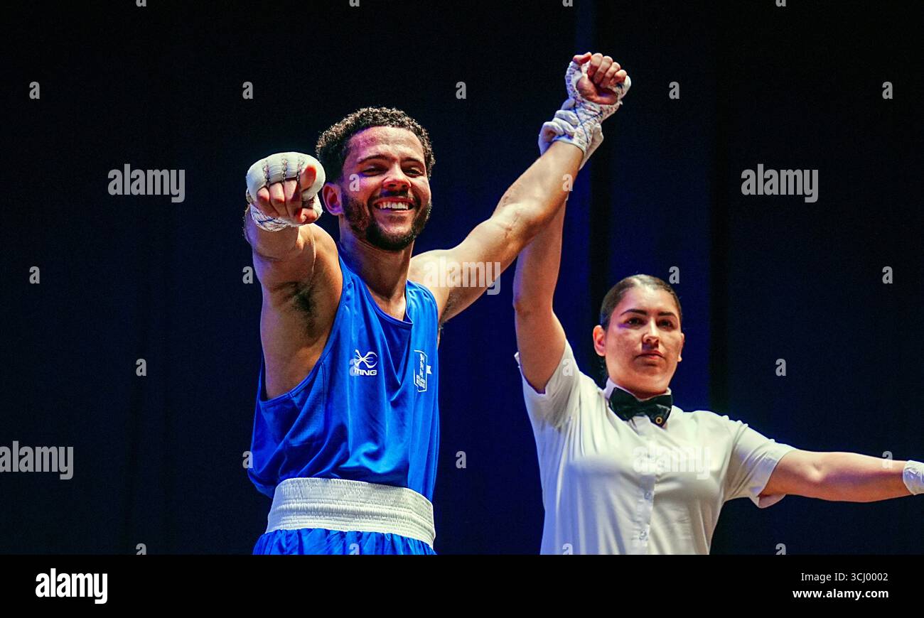 Ellis Trowbridge of England (left) celebrates his victory over Ardit ...