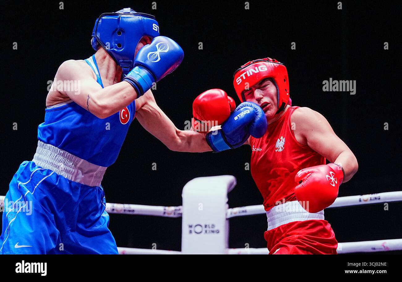 Oliwia Toborek of Poland (right) in action against Busra Isildar of ...