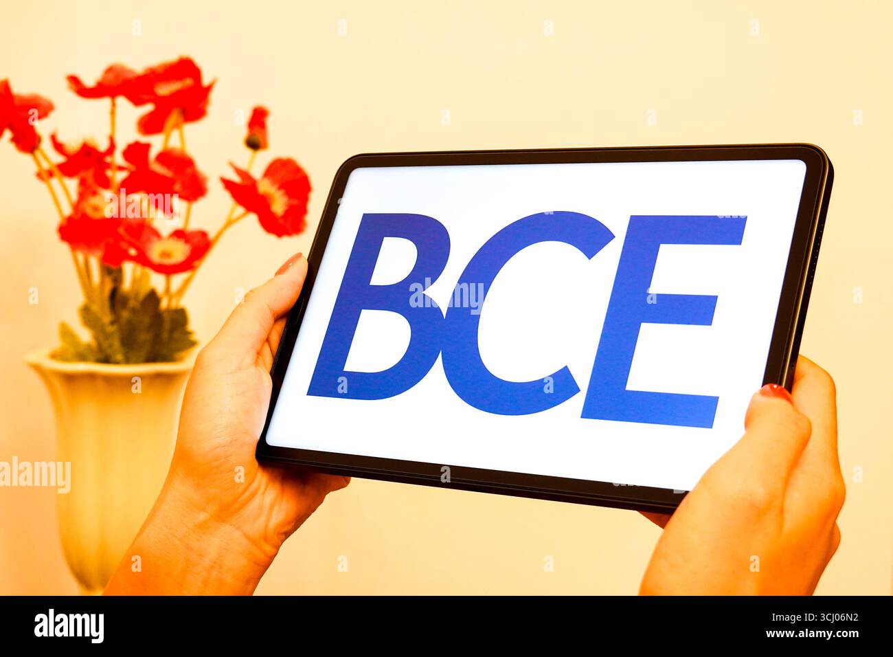 In this photo illustration, the logo of BCE Inc. is displayed on the ...