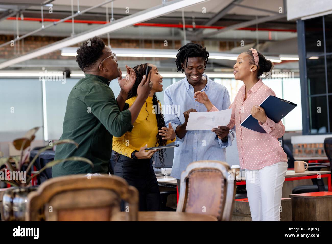 Collaborating coworkers sharing ideas hi-res stock photography and ...