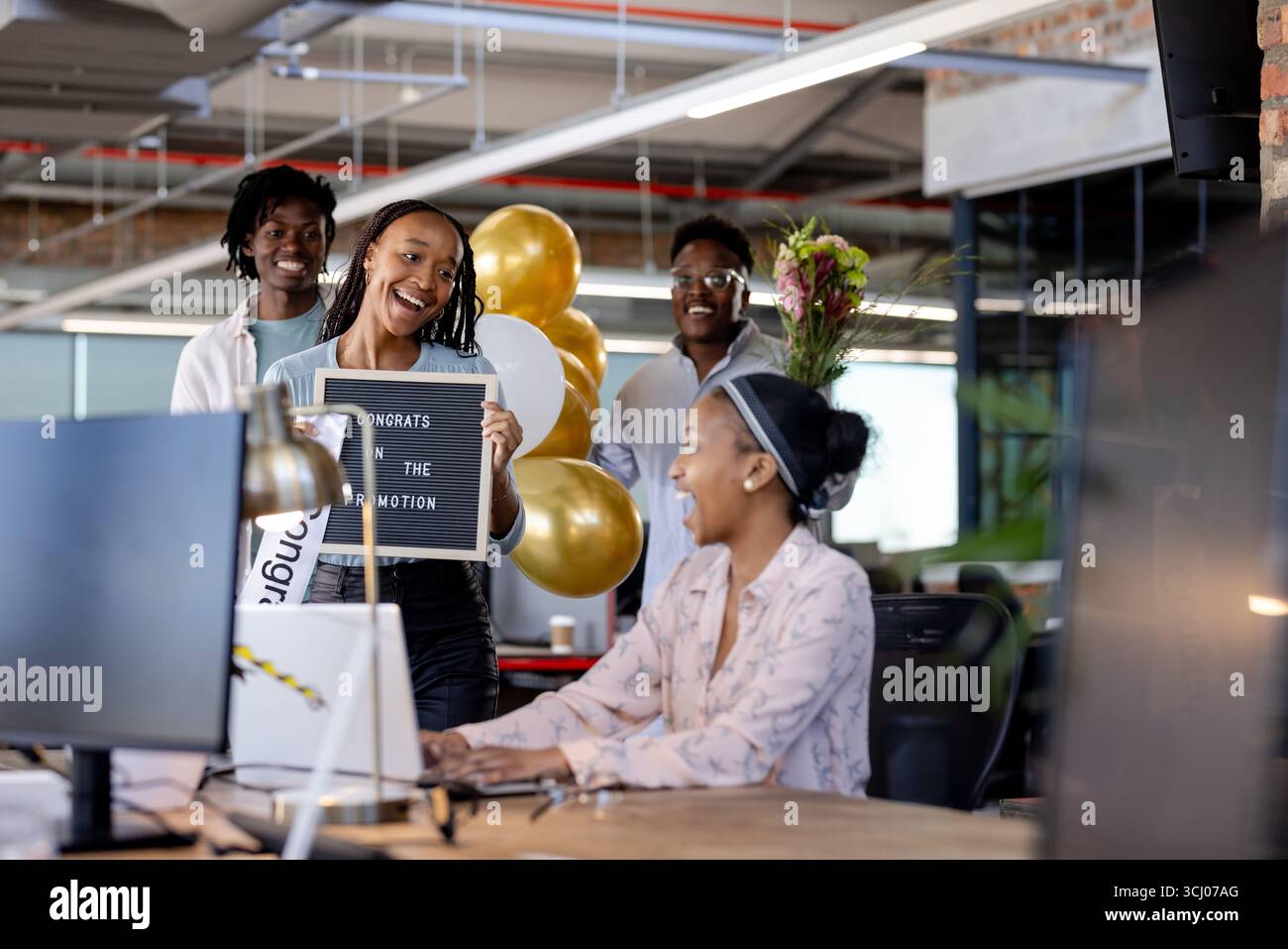 Celebrating promotion african american hi-res stock photography and ...