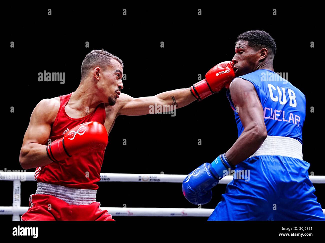 Kevin Scott (left) in action against Jorge Cuellar in the Men's 70kg ...