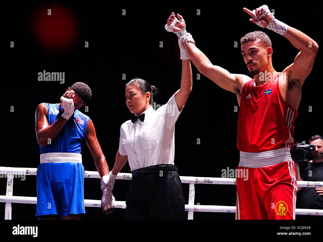 Kevin Scott (right) celebrates victory against Jorge Cuellar following ...