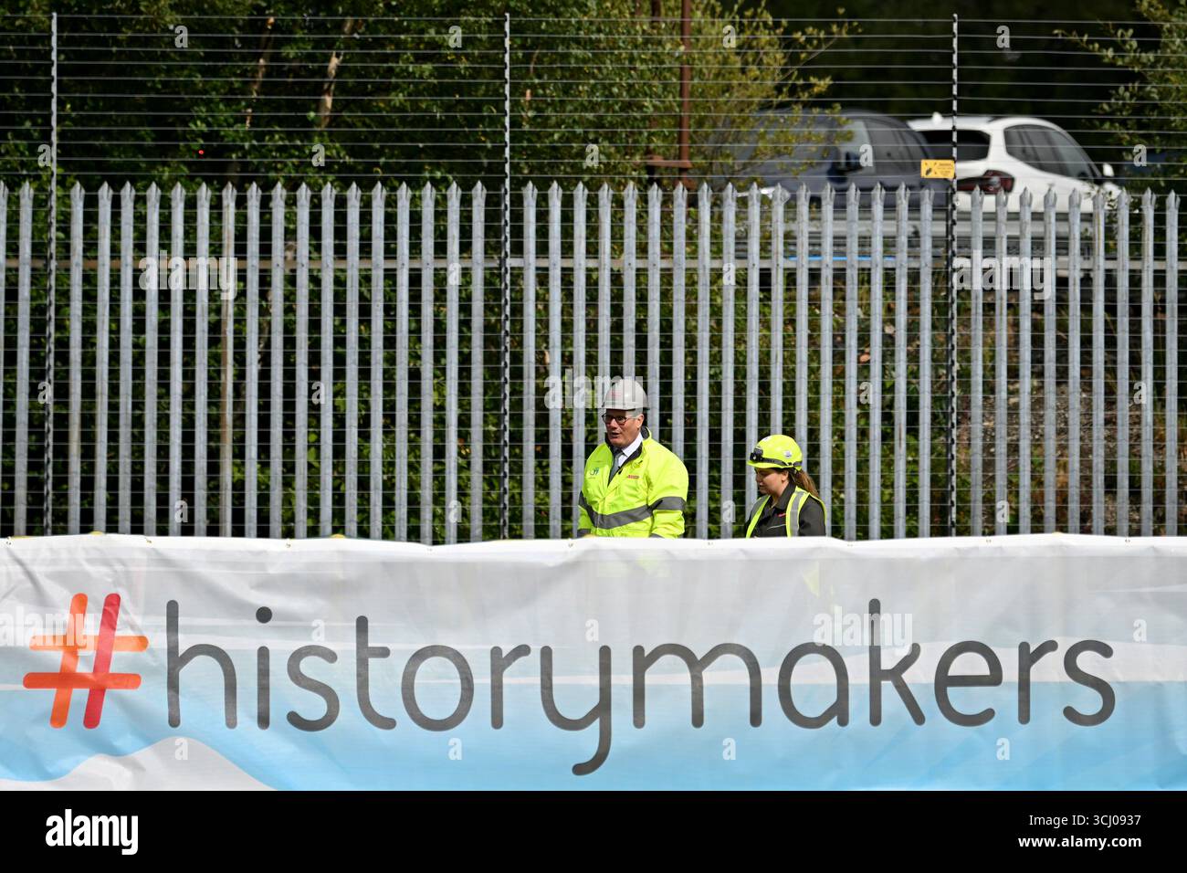 Britain's Prime Minister Keir Starmer, left, walks with electral ...