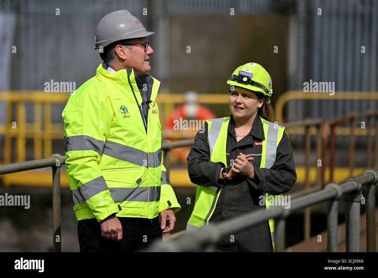Britain's Prime Minister Keir Starmer, left, walks with electral ...