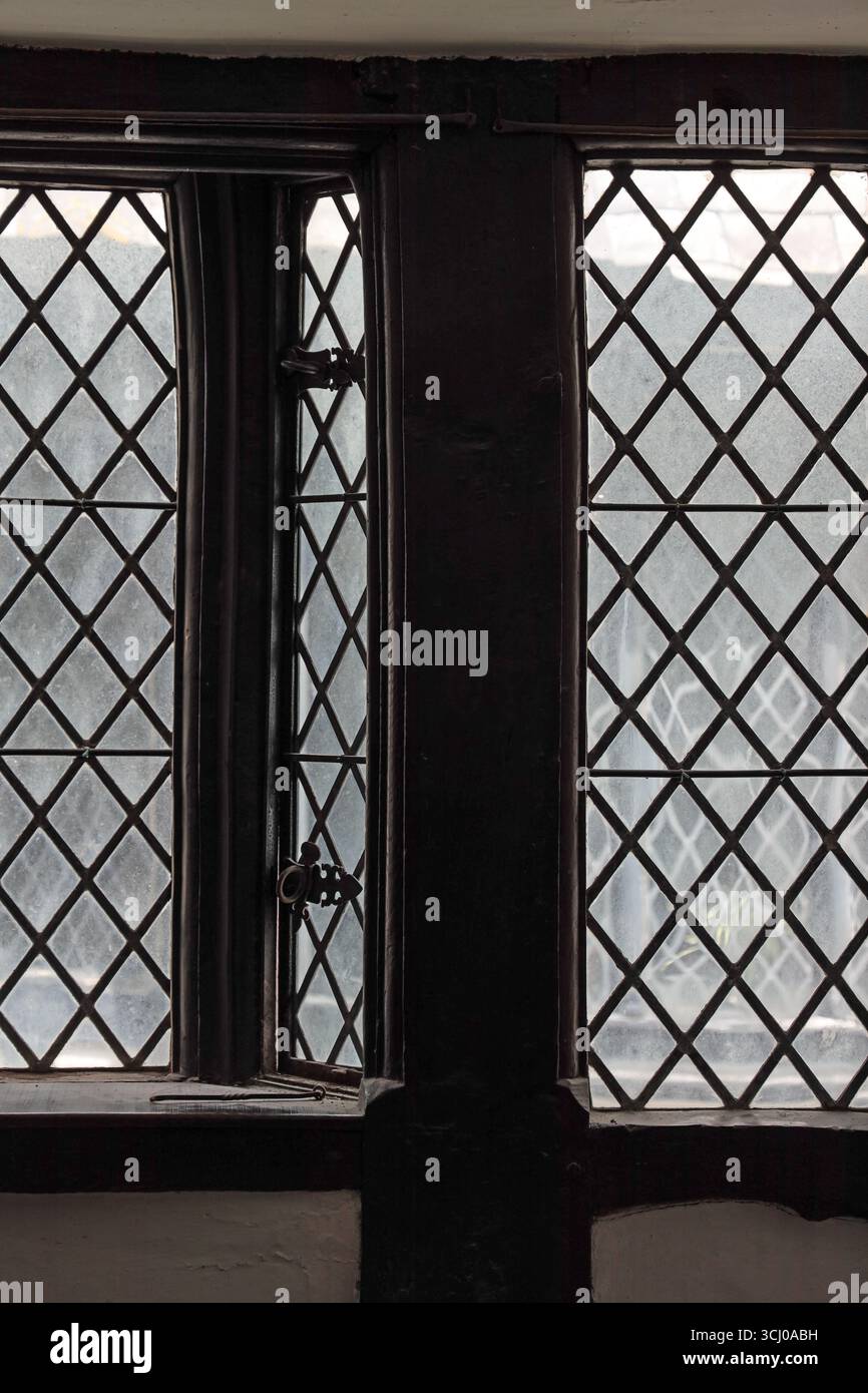 Leaded windows at top of Tudor building in New Street, Plymouth taken ...