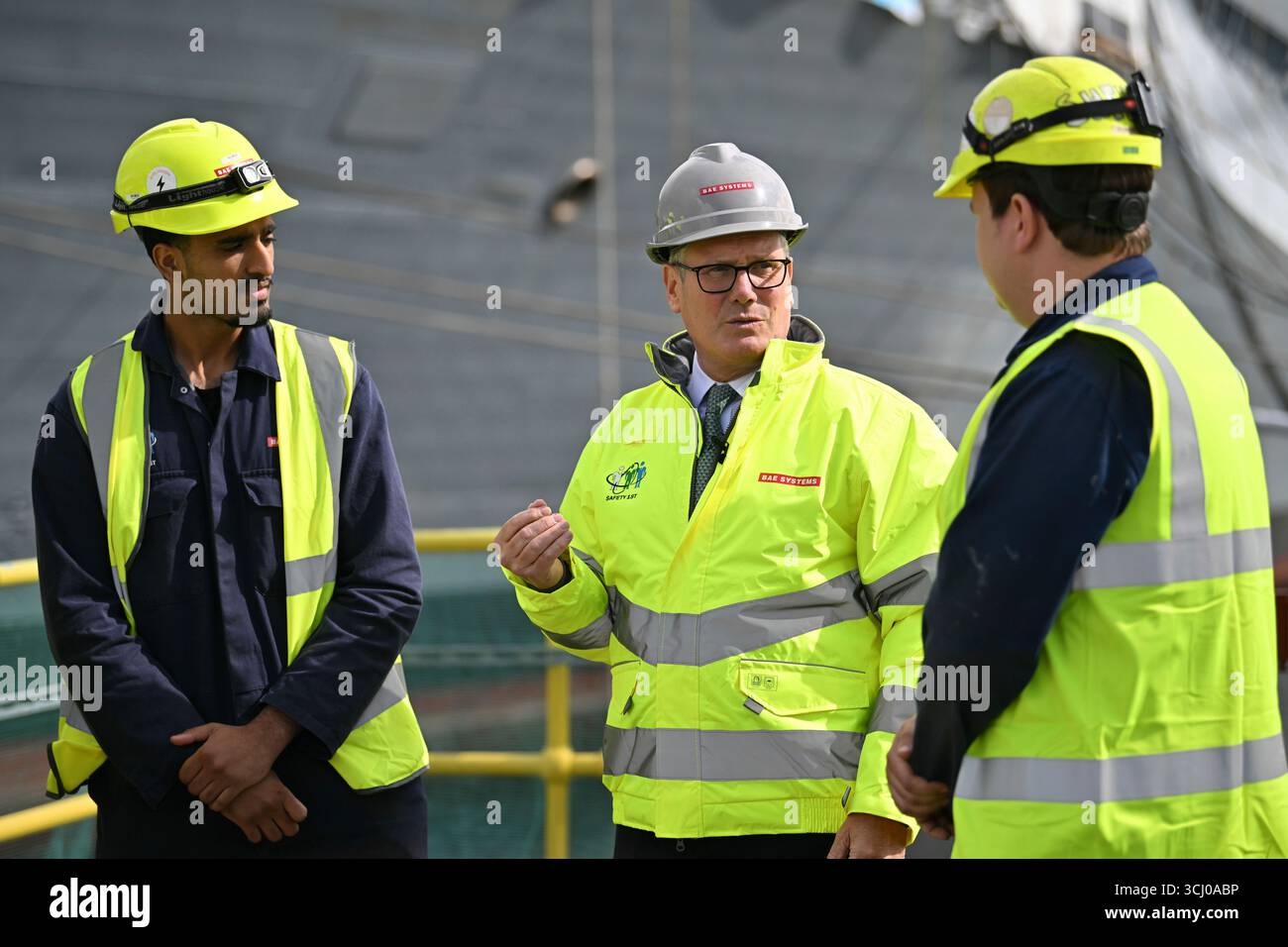 Britain's Prime Minister Keir Starmer speaks to apprentices ...