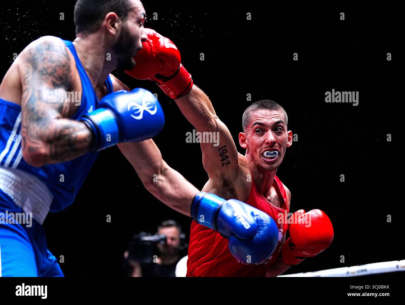 Frank Martinez (right) in action against Yurii Zakharieiev during the ...