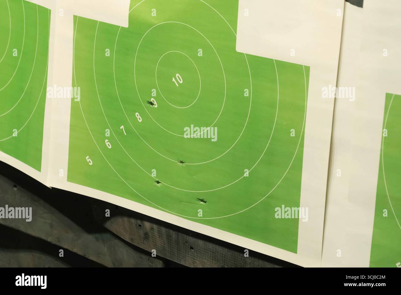 Green shooting targets in a shooting range, some targets are shot Stock ...