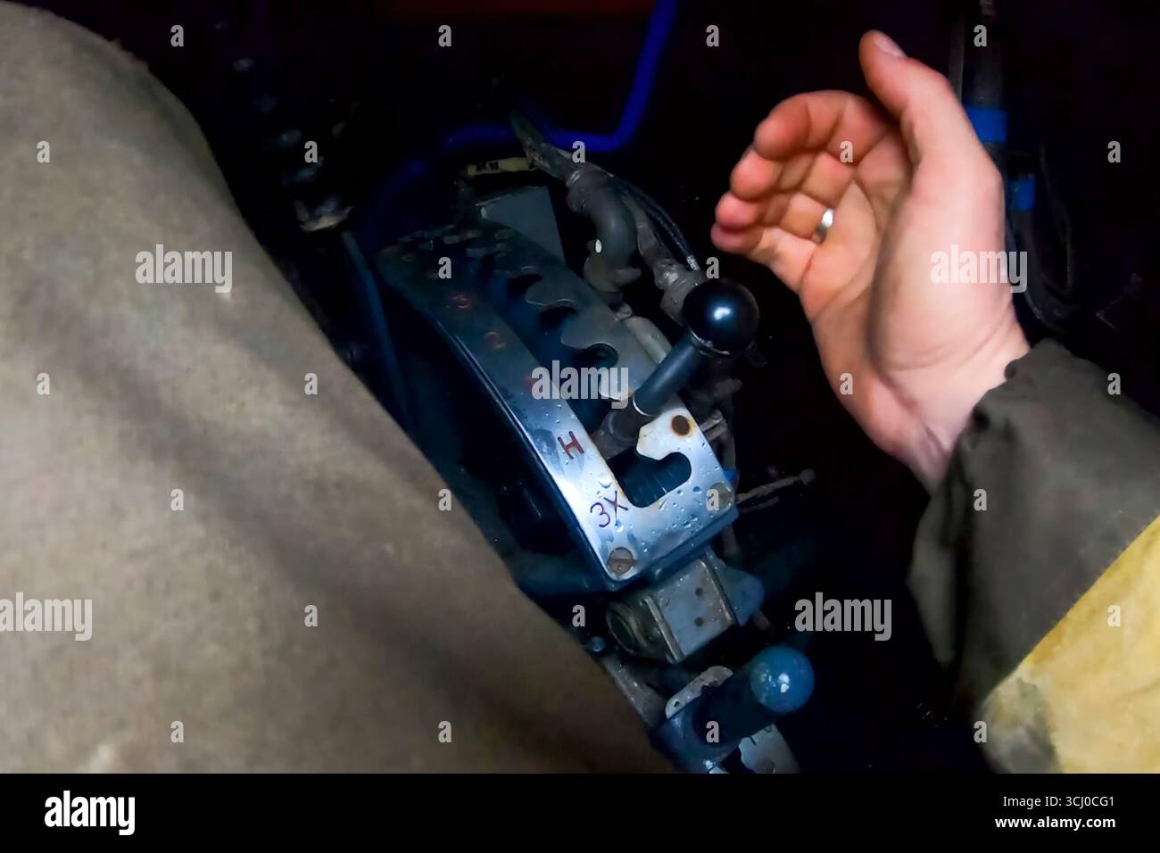 Man s hand on gear lever of T-72 tank. T-72 tank testing at proving ...