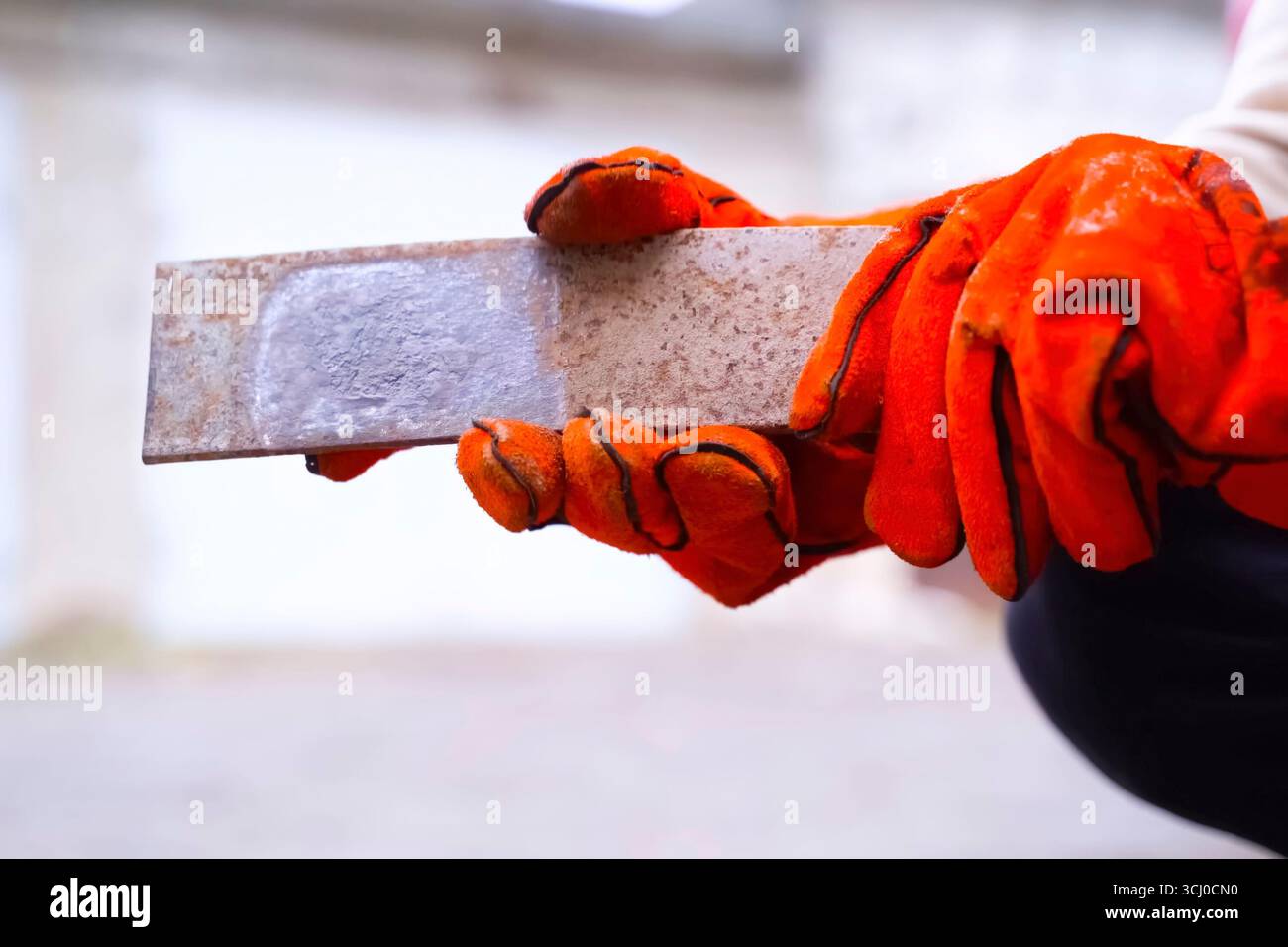 Welder in red protective hi-res stock photography and images - Alamy