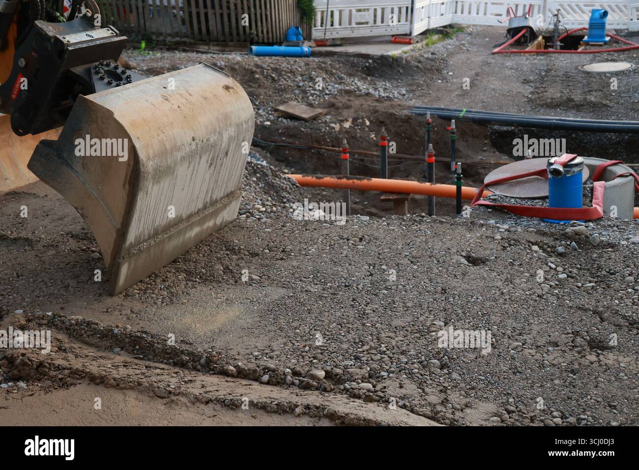 Large construction site with a large shovel digging into the ground ...