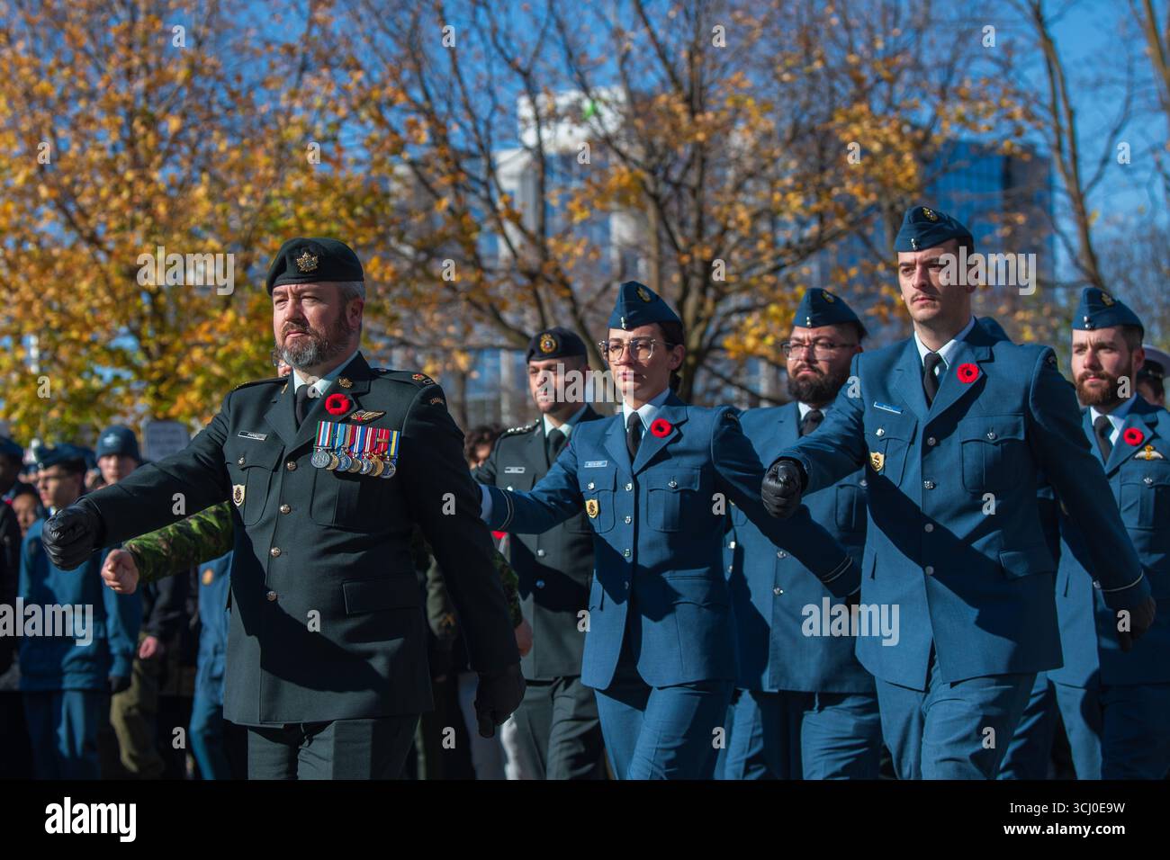Canadian Armed Forces soldiers walk in synch during a Remembrance Day ...