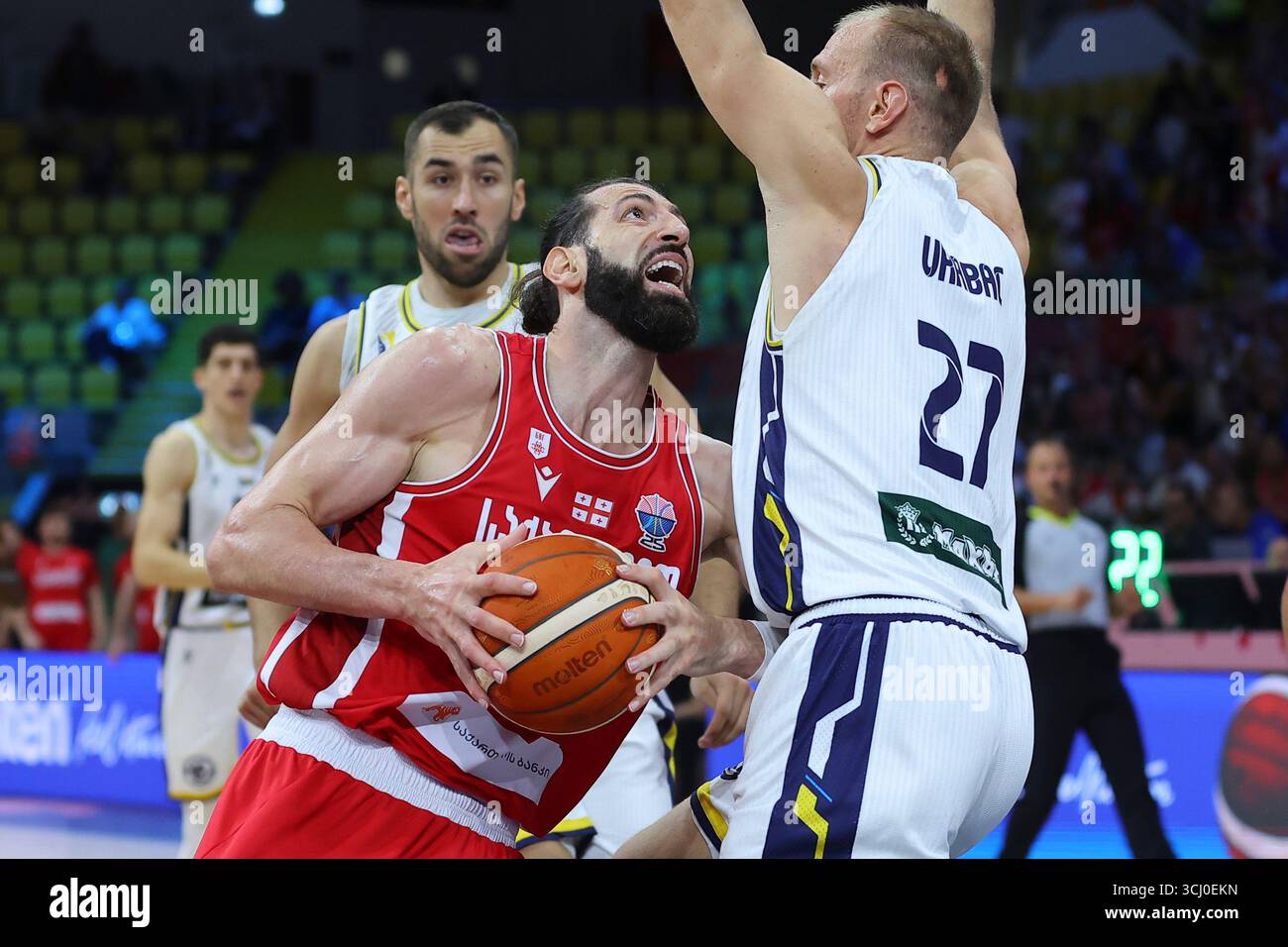 Georgia's Tornike Shengelia, center, goes to score as Bosnia's Adin ...