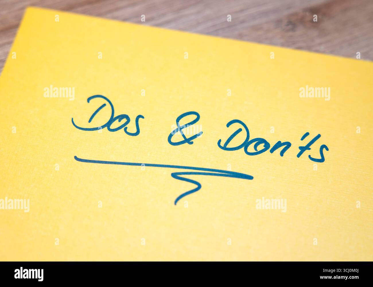 Dos and Don ts Dos and Don ts. Yellow note with handwritten text ...