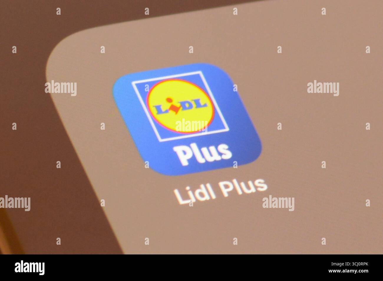 Lidl plus supermarket app on smartphone screen hi-res stock photography ...