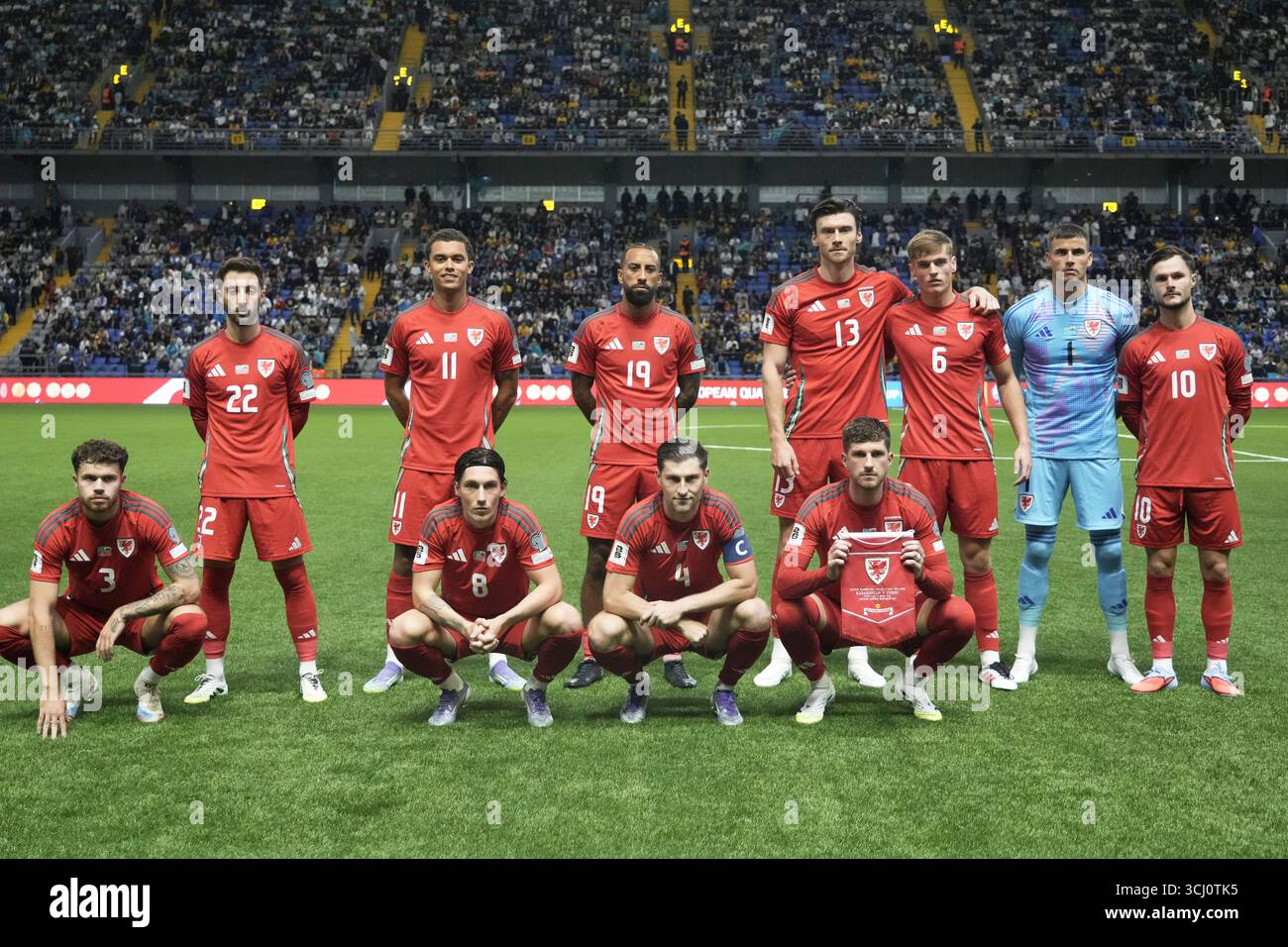 Wales' starting players pose for a team photo at the beginning of the 2026 FIFA World Cup ...
