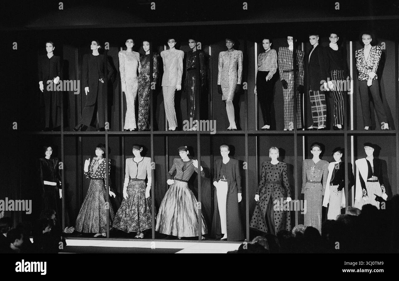 FILE - Models presenting the Giorgio Armani fashion collection stand in ...