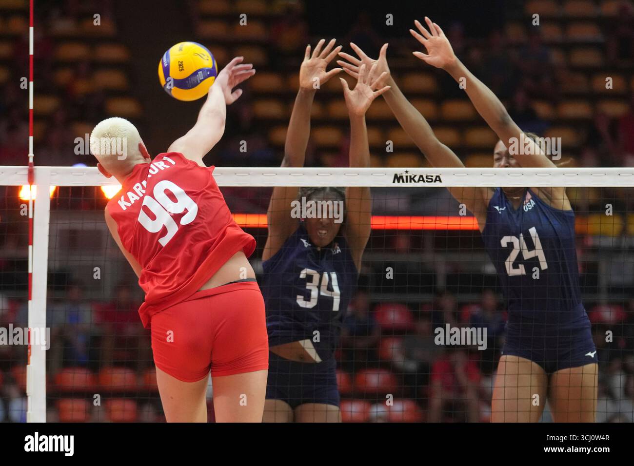 United States' Stephanie Samedy, center, and Chiaka Ogbogutry, right ...
