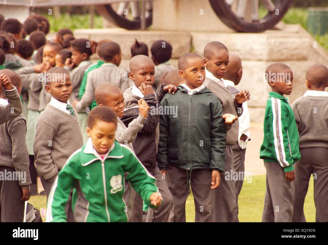 African schoolboys in uniforms gathering together Stock Photo - Alamy