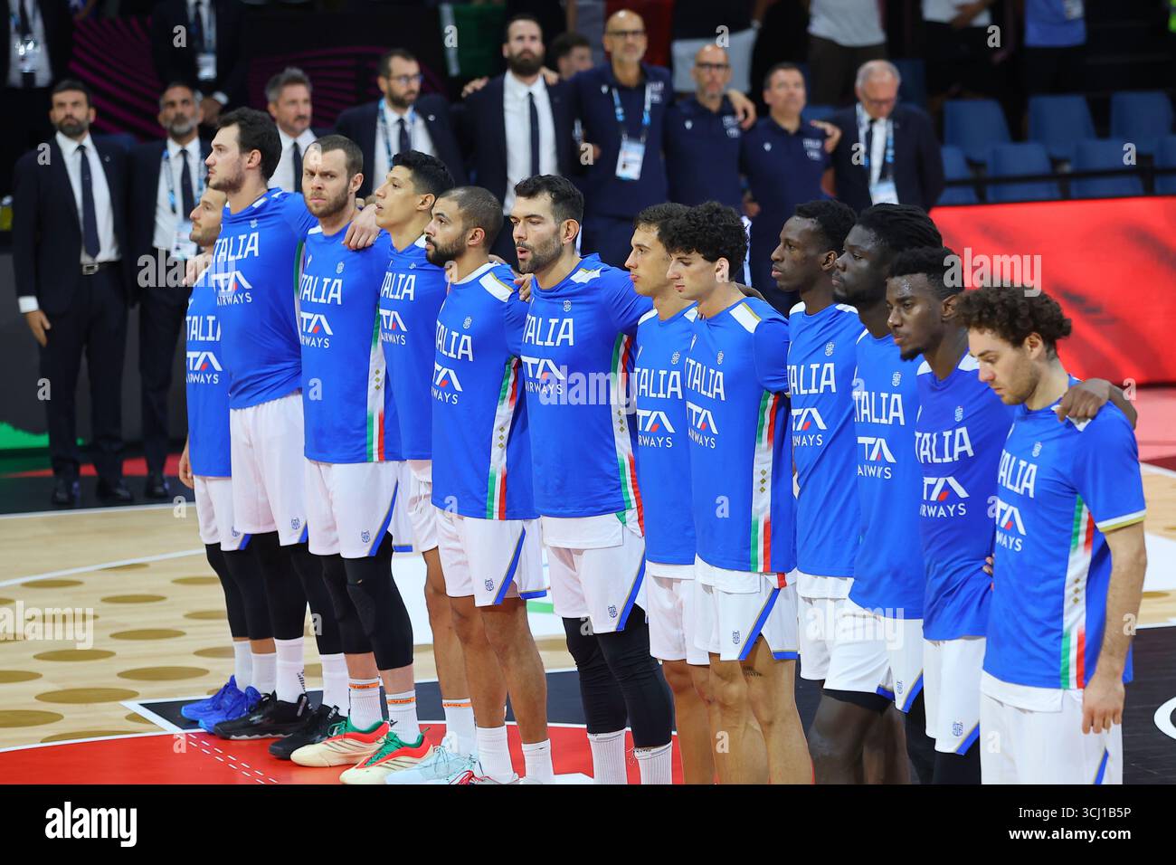 Italy players stand for the national anthem of their country before the ...
