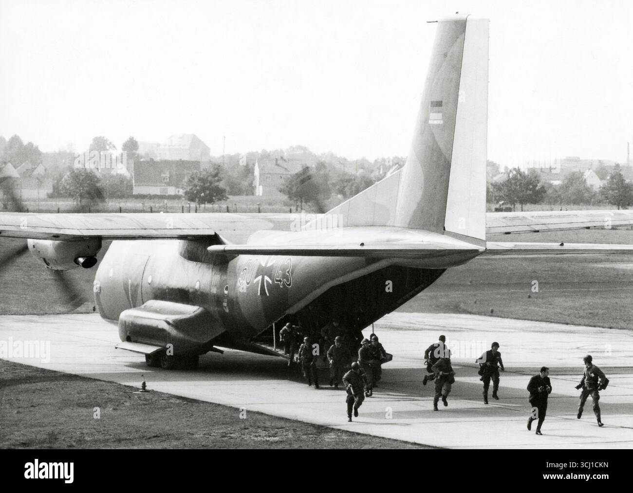 Soldiers disembarking from a C-160 Transall, a Franco-German military ...
