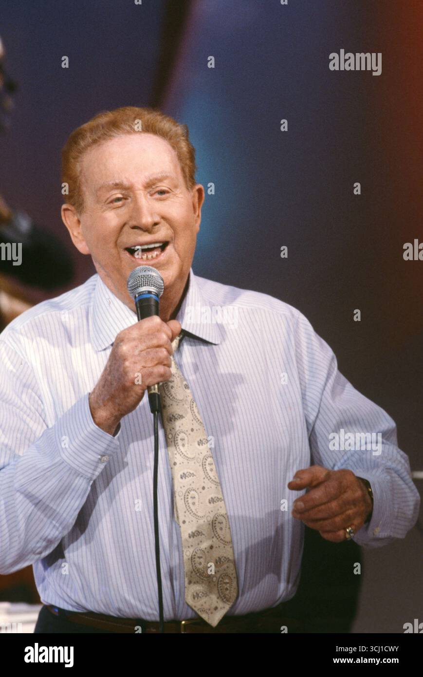 French singer Charles Trenet on the set of a television programme in ...