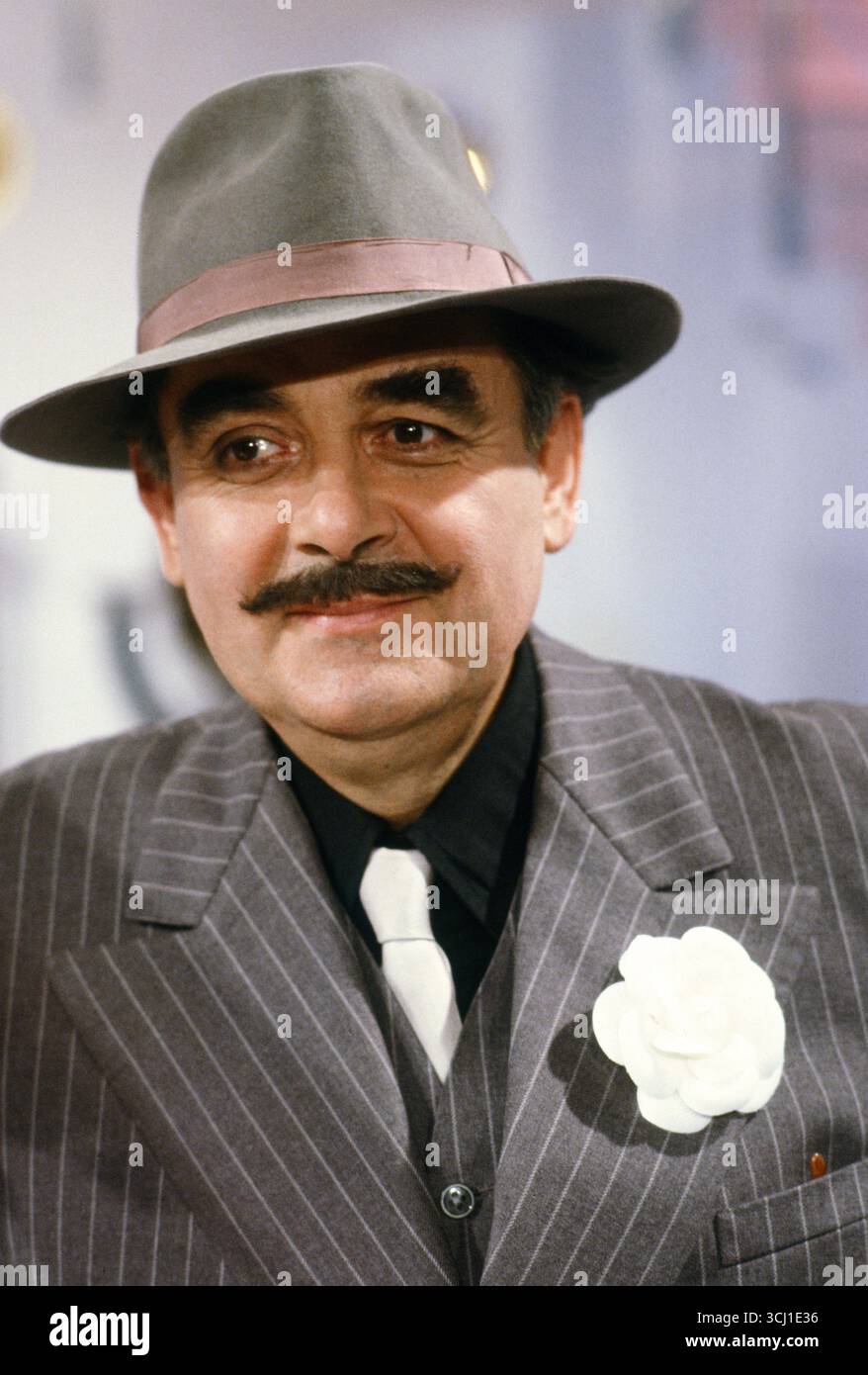 French television presenter Bernard Pivot dressed as Hercule Poirot ...