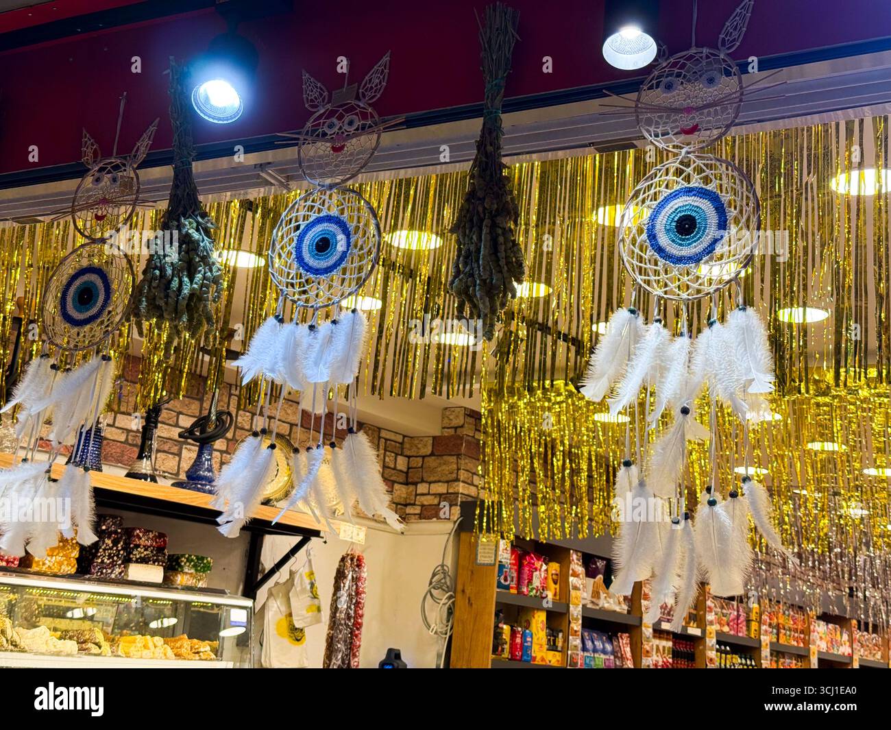 Colorful dreamcatchers with feathers and protective eye symbol in ...