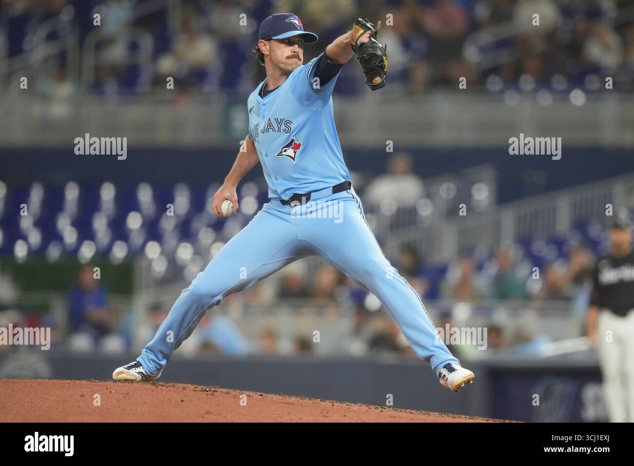 Toronto Blue Jays starting pitcher Shane Bieber aims a pitch during a ...