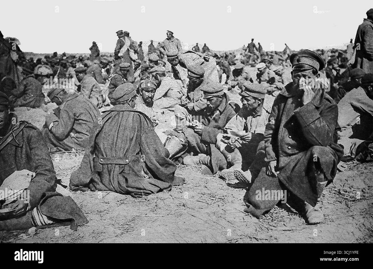This 1916 photograph from Le Miroir shows Bulgarian prisoners seated on ...
