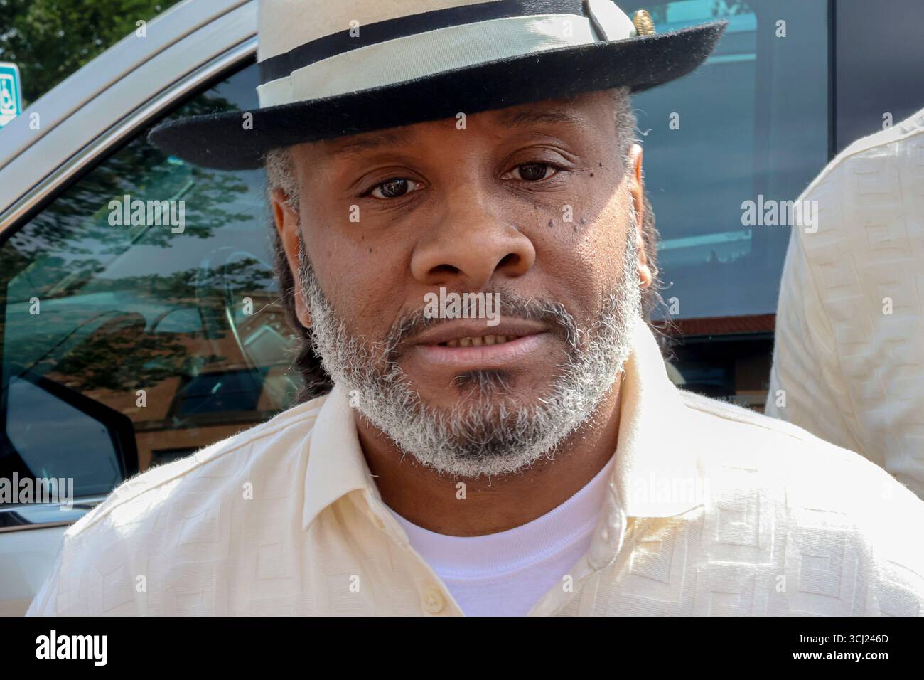 Brian Hooper Sr. speaks to reporters outside Stillwater Prison on Sept ...