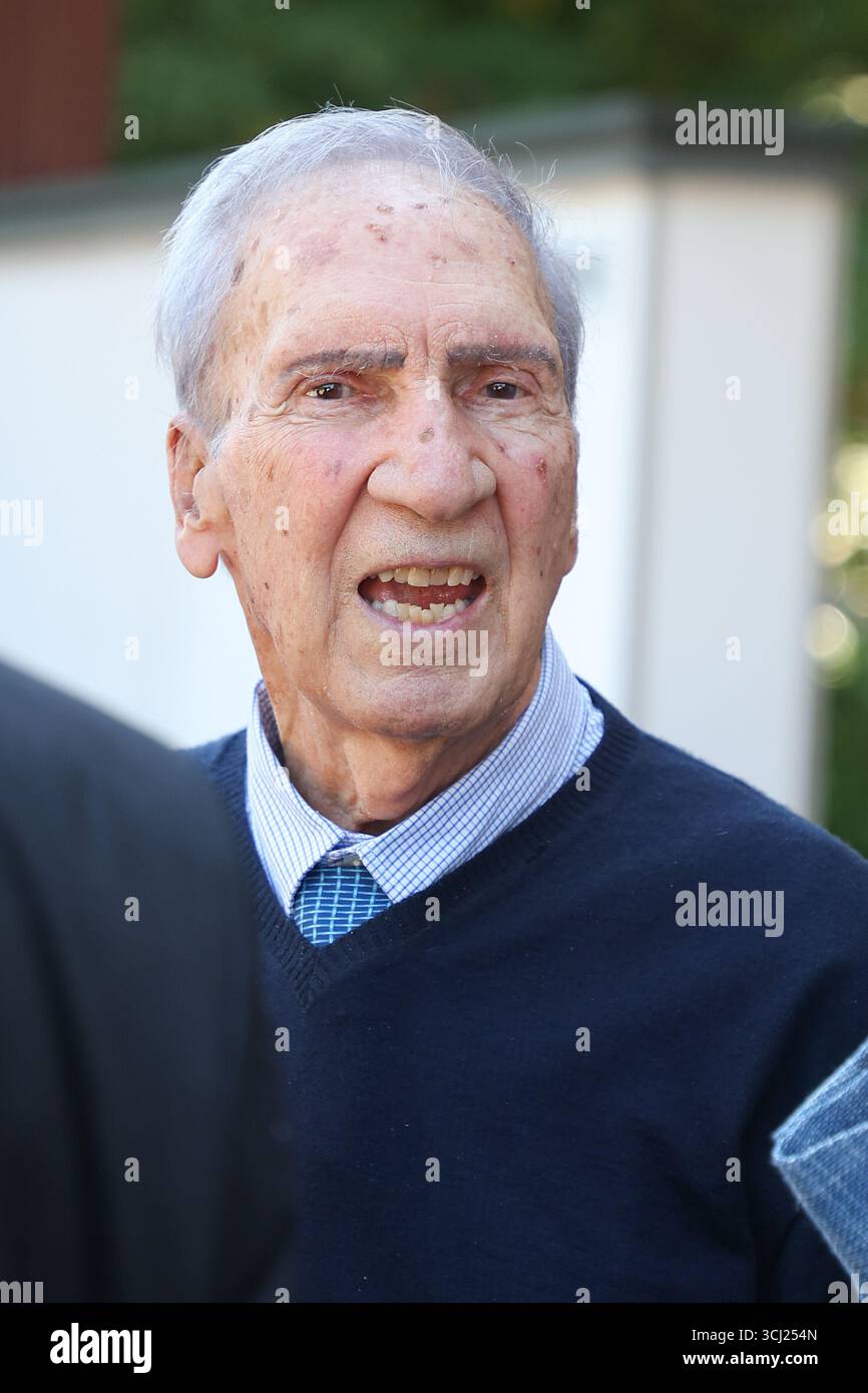 Puccio Fede, Emilio Fede's brother at the funeral during the News ...