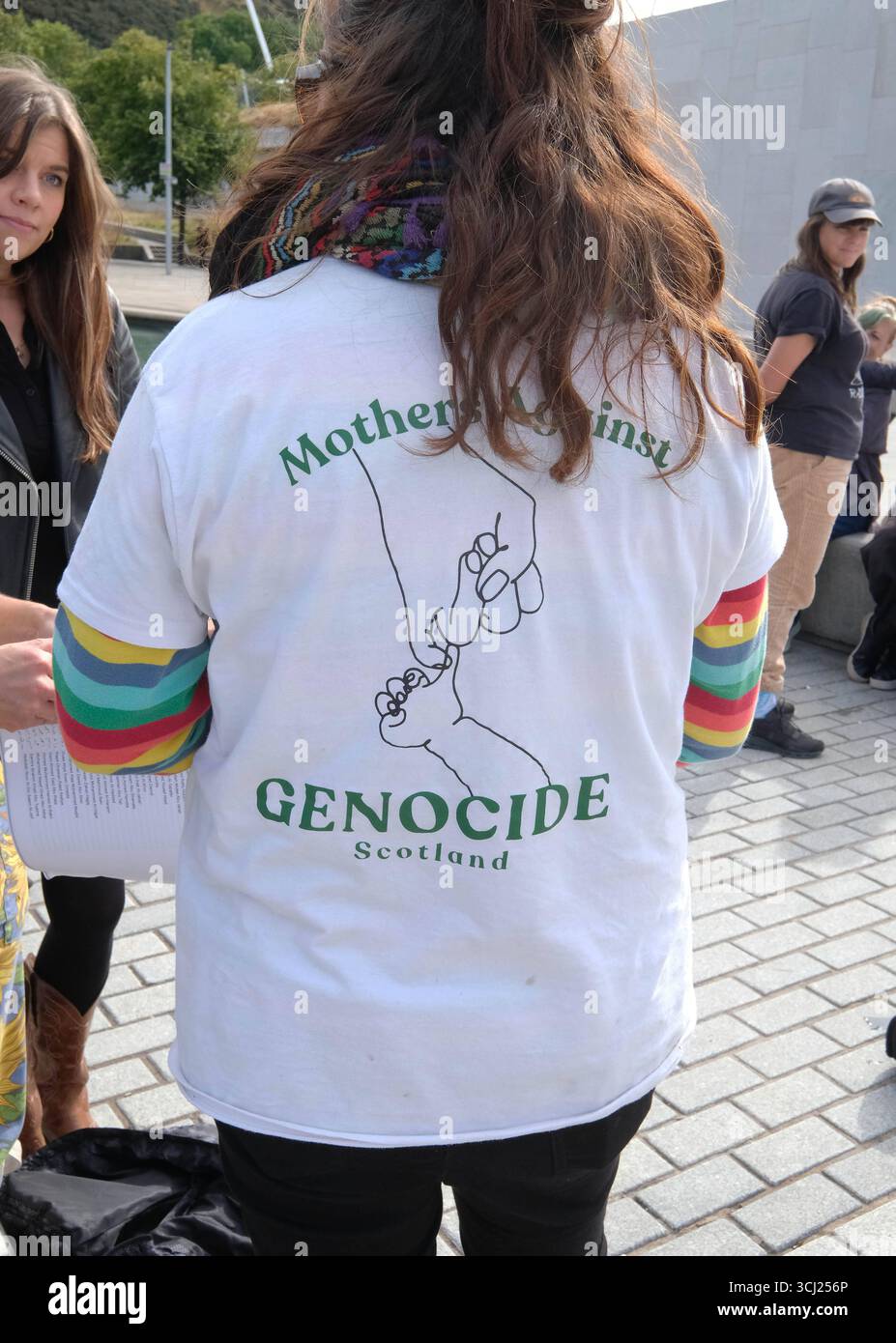 Mothers against genocide protest hi-res stock photography and images ...